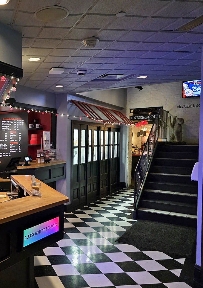 The waiting game begins! Rustic wooden benches outside Hunt's sunny yellow exterior prove that the best seafood joints always have people lingering before the doors even open.