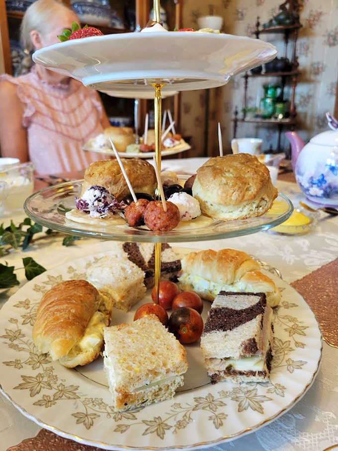 Three tiers of temptation: This traditional tea service offers savory bites, fresh scones, and sweet treats &ndash; the full Victorian experience.
