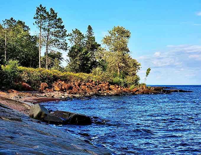 The view reveals nature's artistry &ndash; a winding ribbon of water cutting through layers of geological history.