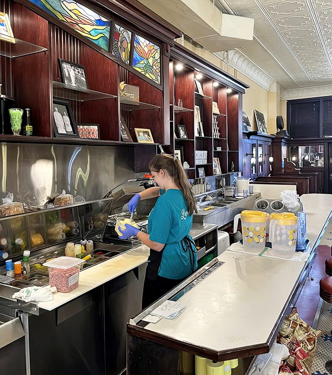 The staff works with the precision of artisans and the warmth of old friends &ndash; many have been there for decades, remembering regulars' orders and family stories.