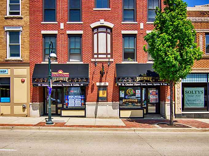 The Beehive's classic storefront buzzes with the promise of cold drinks and warm conversations &ndash; the kind of place where "just one more" becomes a running joke.