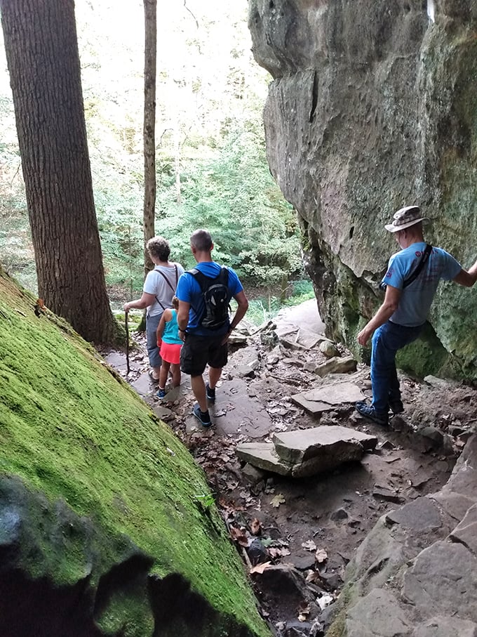 Explorers navigate the trail's rocky terrain, where each step requires attention and rewards you with new perspectives.
