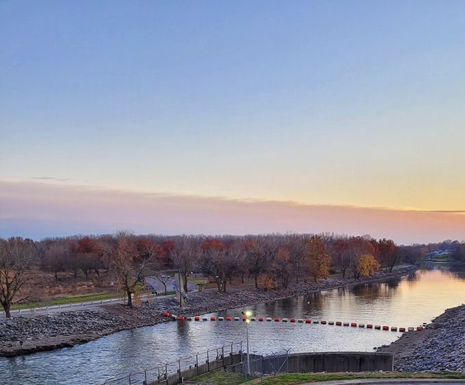 This weathered dock stretches toward the horizon, inviting dreamers to sit awhile and contemplate life's bigger questions at sunset.
