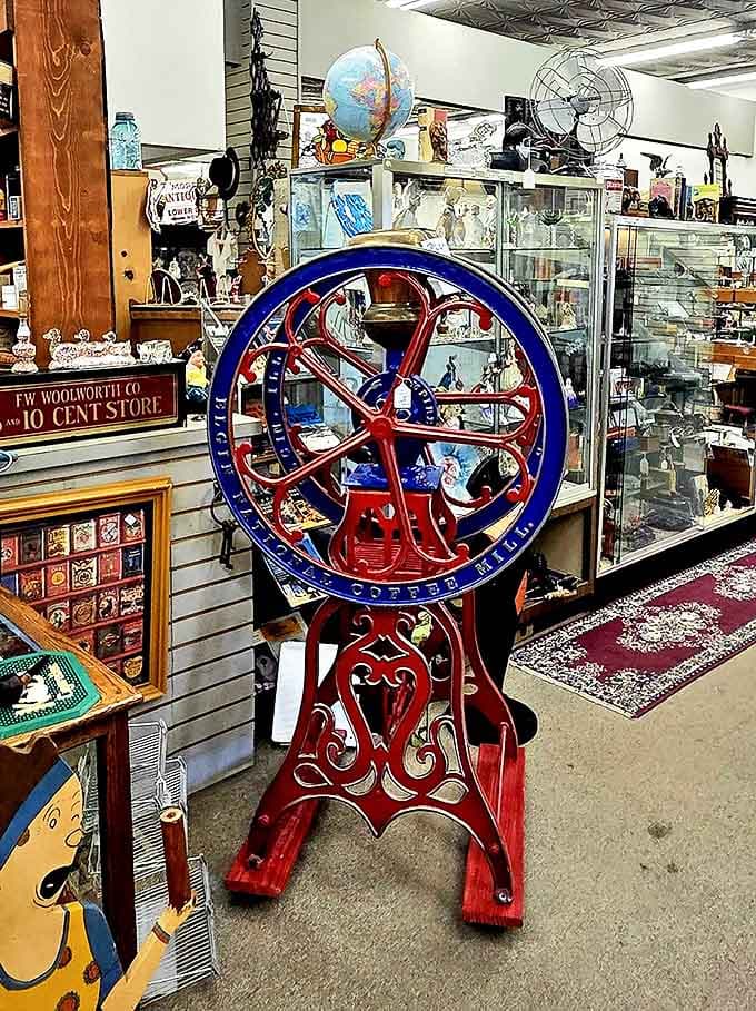 This magnificent cast iron wheel stands as industrial art &ndash; once powering someone's livelihood, now a sculptural reminder of American craftsmanship.