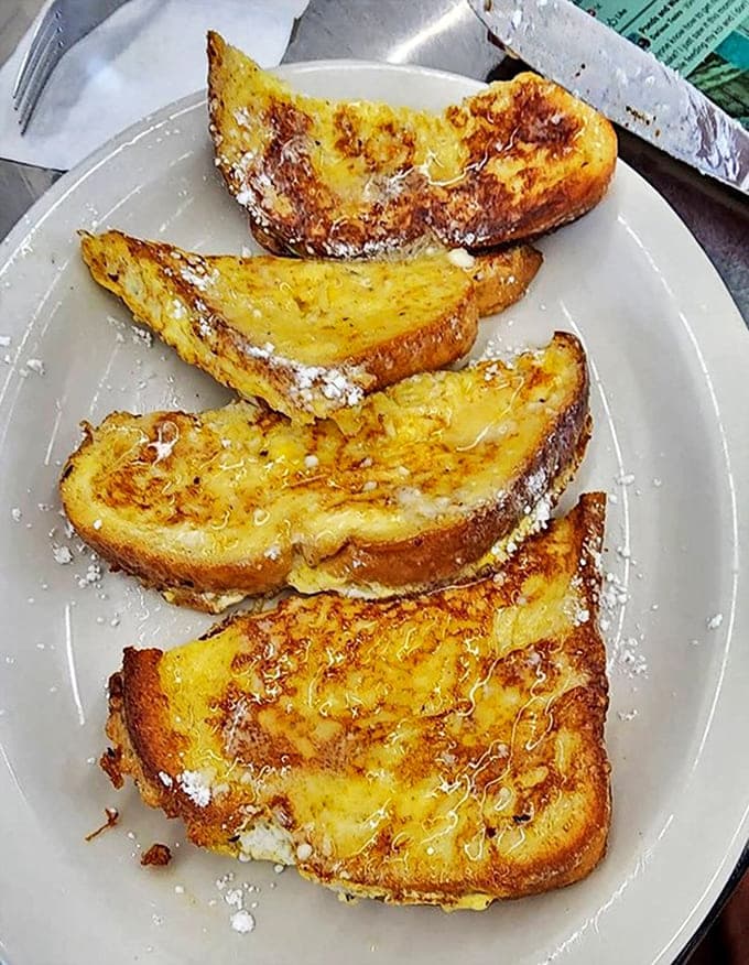 French toast that makes you question why anyone would bother with fancy brunch&mdash;golden, crispy edges giving way to custardy centers.