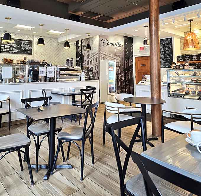 Modern minimalism meets French caf&eacute; charm in a dining space that invites lingering conversations and unhurried pastry appreciation.