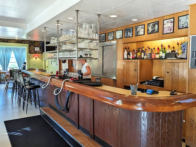 The bar area balances vintage charm with efficient service &ndash; where regulars have been claiming the same seats for decades.
