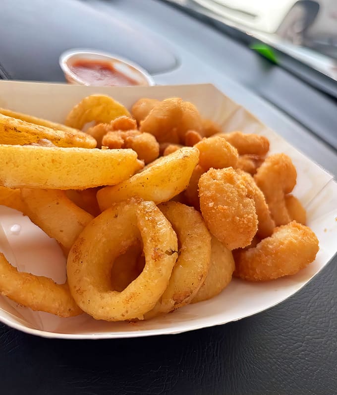Perfectly fried onion rings with just the right crunch-to-sweetness ratio – these golden hoops disappear faster than you can say "just one more."