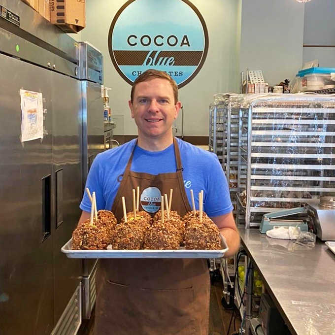 Fresh chocolate creations take shape as skilled hands transform premium ingredients into treats worth driving across state lines for.