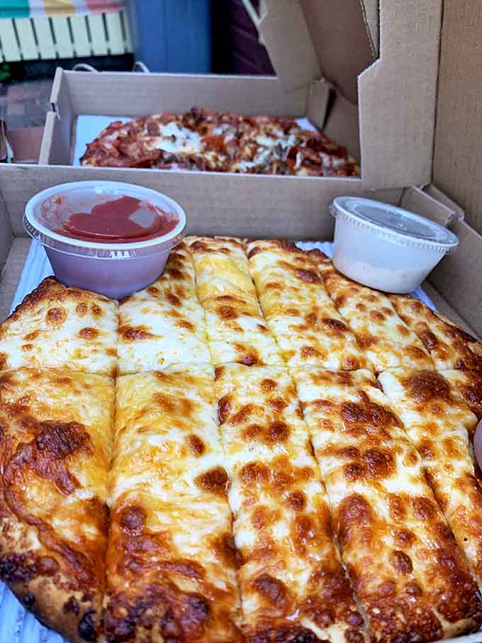 The four-cheese pizza and breadsticks combo showcases their commitment to the classics &ndash; executed with the precision that turns simple into spectacular.