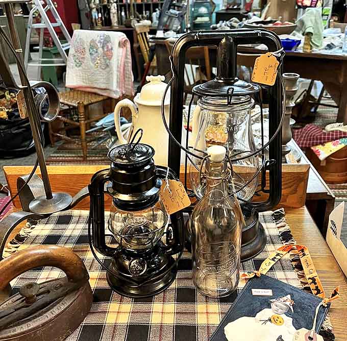 Antique kerosene lamps stand ready to illuminate your home with the warm glow of history – each one cleaned, rewired, and waiting for its second act.