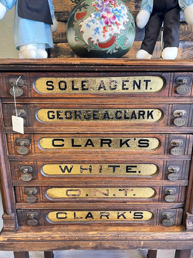 This antique spool cabinet once organized thread for Clark's, proving that even utilitarian storage can become beautiful when crafted with care and proper wood.