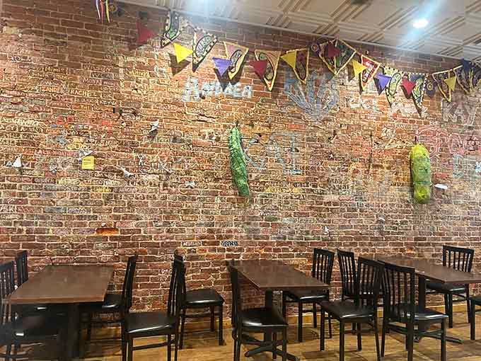 Colorful pennants and artistic touches transform this dining space into a welcoming haven for carb enthusiasts everywhere.
