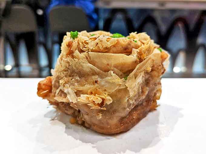 This isn't just baklava; it's phyllo dough that decided to build a nest, then filled it with honey-soaked nuts that nestle like precious treasures.