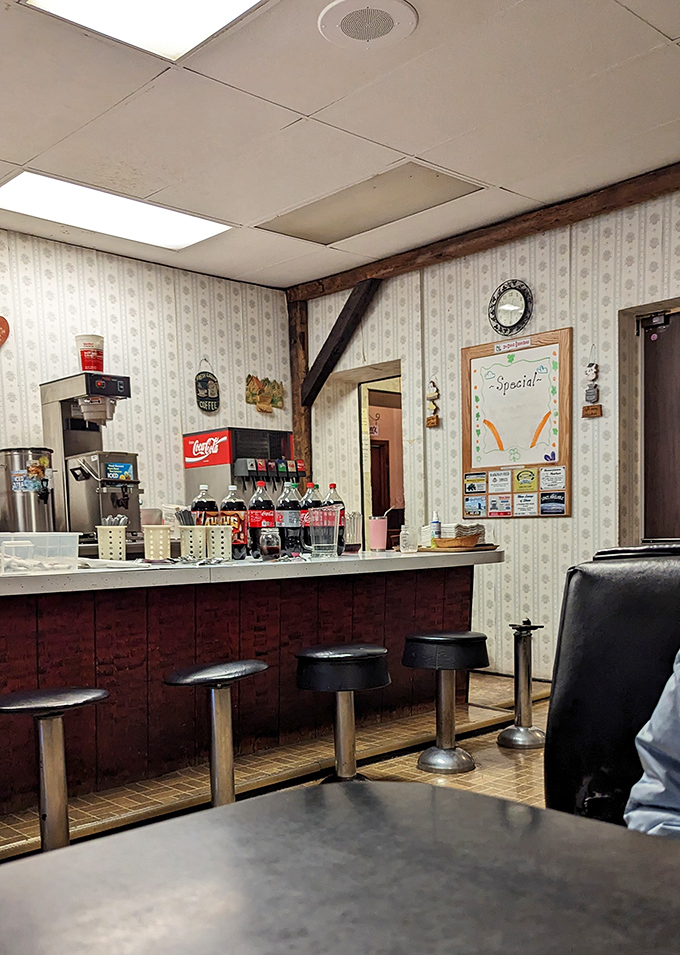 The counter seating area offers a front-row view of the action, where regulars exchange friendly banter with staff who remember their usual orders.