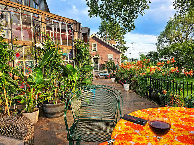 The outdoor patio offers garden views and colorful tablecloths, creating the perfect spot for morning coffee or evening wine, your choice.