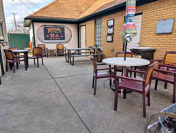The outdoor patio proves that sometimes the best reading happens under open sky with a fresh pastry as your companion.