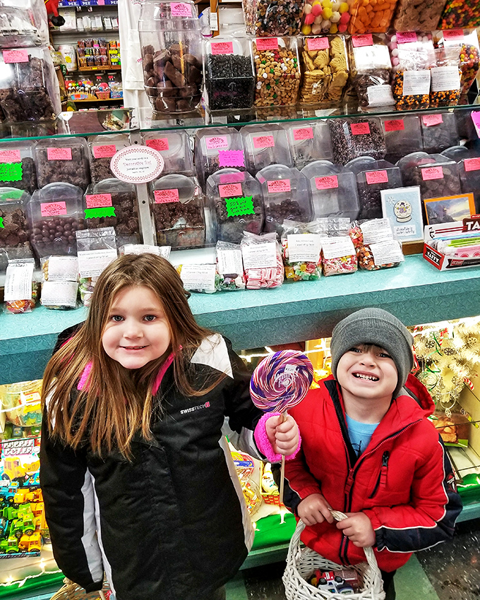 Young candy enthusiasts experience the timeless joy of selection, proving that some childhood pleasures transcend generations and technology.