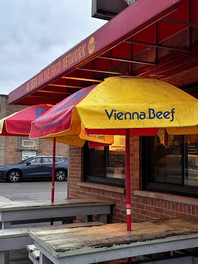 Picnic tables and umbrellas create the perfect al fresco dining situation where burgers taste better under open skies and sunshine.