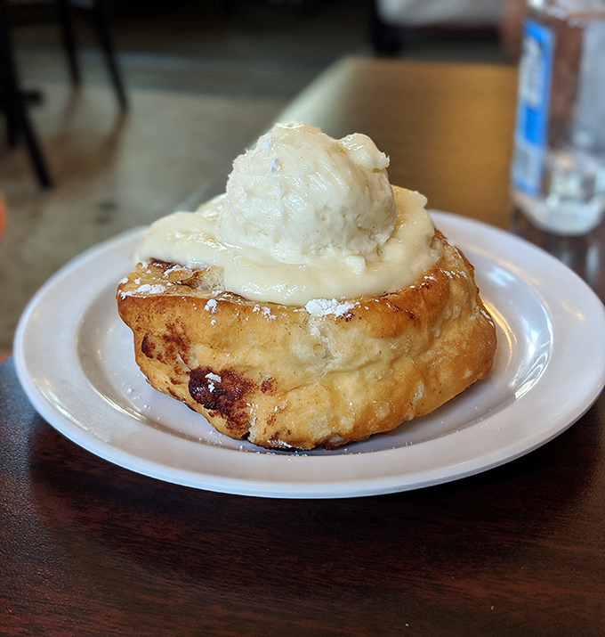 This cinnamon roll, topped with a scoop of vanilla ice cream, is the kind of asset that appreciates the moment it hits your taste buds.