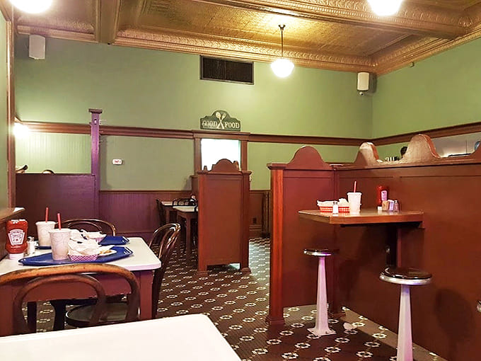 The dining room's vintage charm isn't manufactured nostalgia &ndash; it's the real deal, with wooden booths and classic tile patterns that have witnessed countless Kalamazoo conversations.