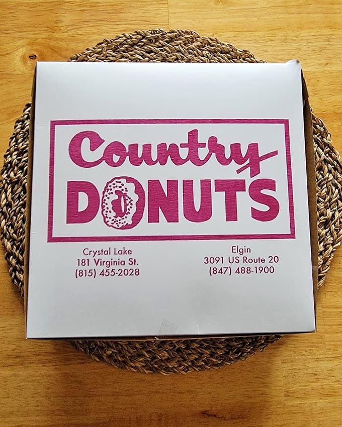 The classic Country Donuts box with locations listed, ready to transport your precious cargo home before you eat them all in the parking lot.