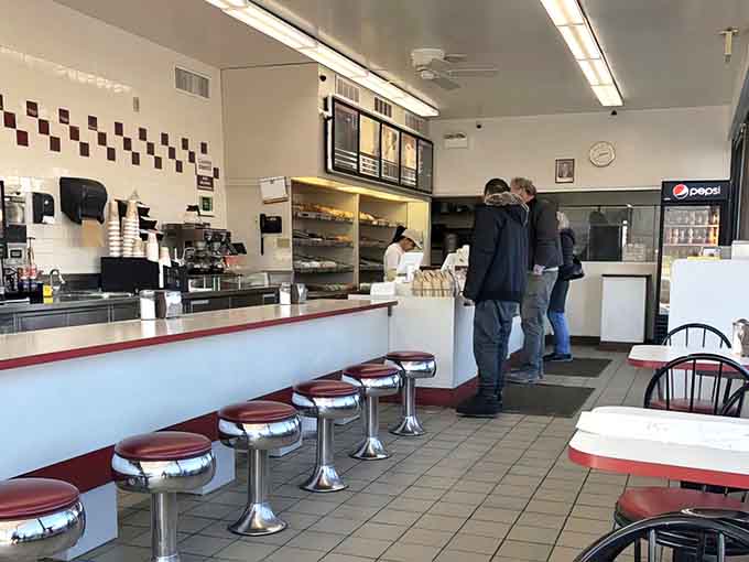 Early morning regulars know the secret: arrive before the crowds descend and the apple fritters disappear like morning fog in sunshine.