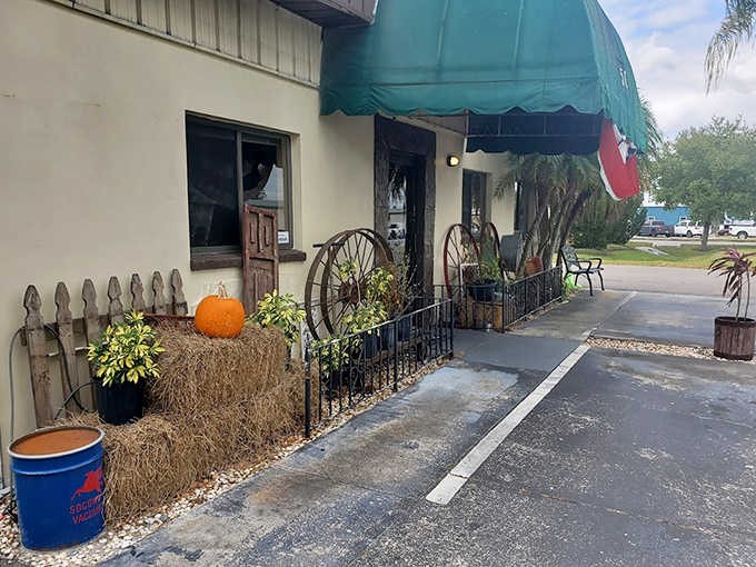 The charming entrance with its hay bale and pumpkin sets the tone for authenticity, a refreshing departure from corporate retail sameness.