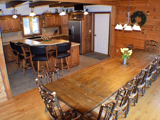 Gather 'round the harvest table, where family-style meals become memorable events in this warm, wood-wrapped dining space.