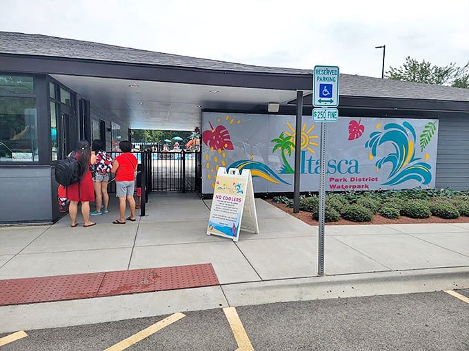 The entrance beckons with tropical promises, a portal where Midwestern reality transforms into a splash-filled fantasy land.