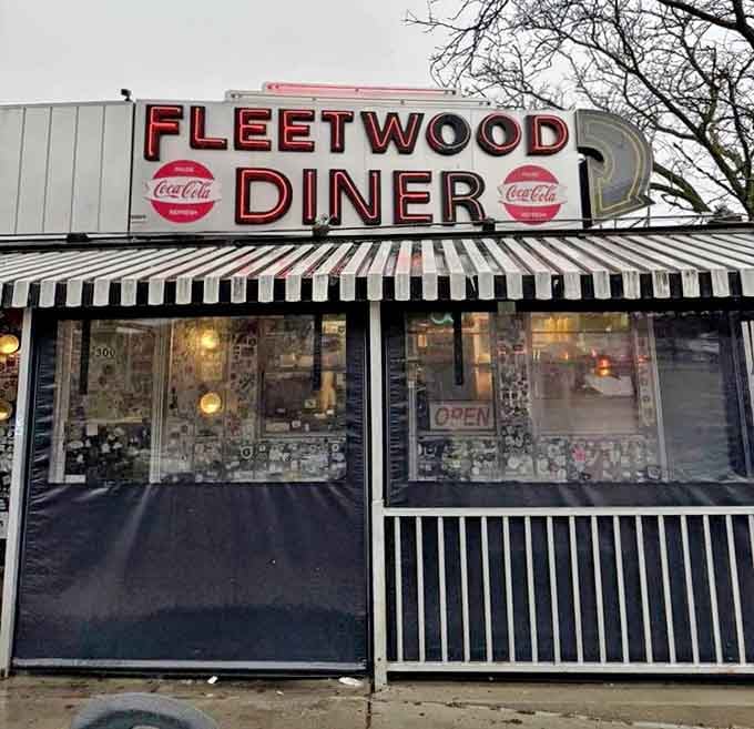 Even on cloudy days, the Fleetwood's neon signage cuts through the gloom, promising comfort food and a warm welcome inside.