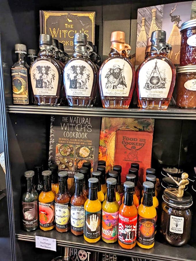 Witchwood syrups and devilishly hot sauces line these shelves, offering culinary adventures for those who like their pancakes with a side of magic.