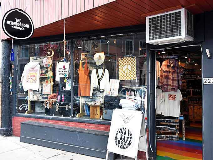 The Neighborhood Trading Company window display promises treasures inside that are as unique as the stories behind them.