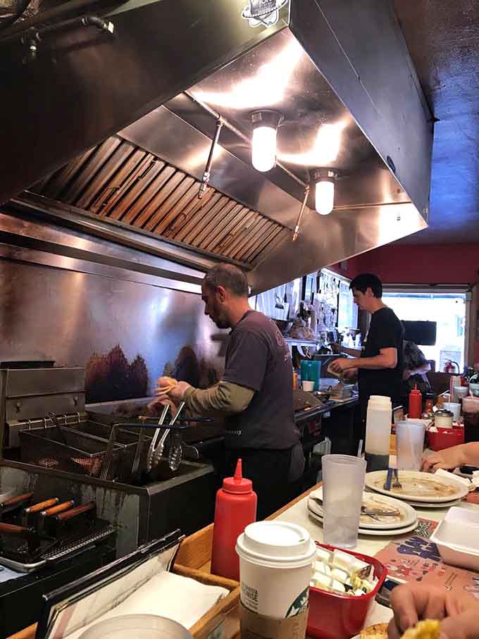 The kitchen crew working their breakfast magic with the efficiency of people who've perfected their craft over countless mornings.