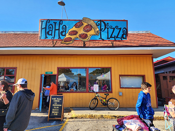 Ha Ha Pizza's whimsical sign promises exactly what it delivers &ndash; seriously good pizza with a side of small-town charm that's no laughing matter.