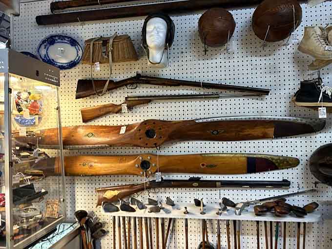 Antique propellers that once helped things fly, now grounded but still impressive as sculptural conversation pieces.