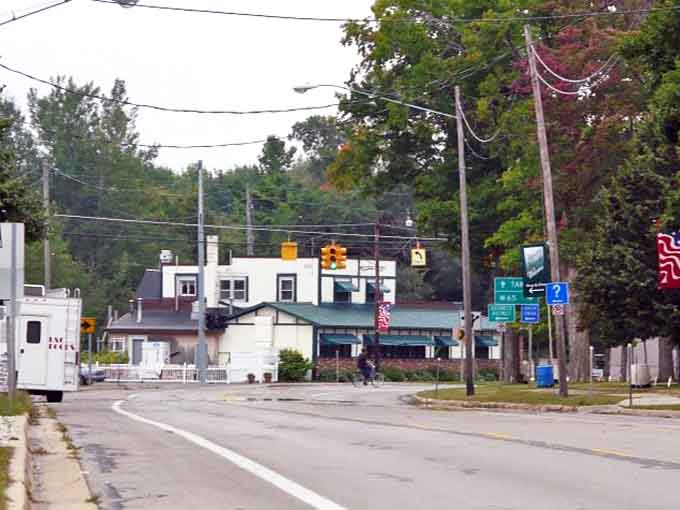 Small-town intersections tell stories of community connections, where locals still wave at passing cars and strangers quickly become friends.