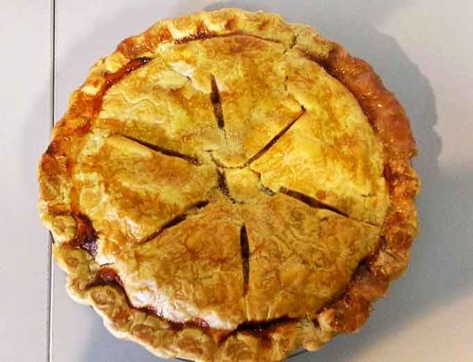 This isn't just dessert, it's an edible work of art with a golden-brown crust that whispers, "One slice will never be enough."