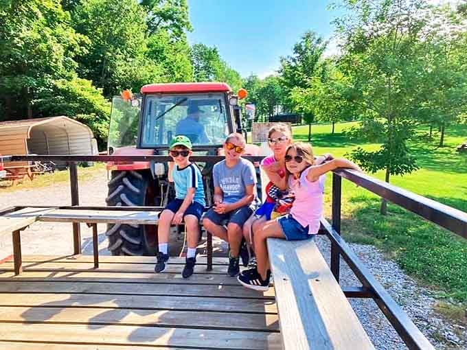 Cool kids on the farm express &ndash; these young adventurers are clearly veterans of the wagon ride circuit, striking poses like pros.