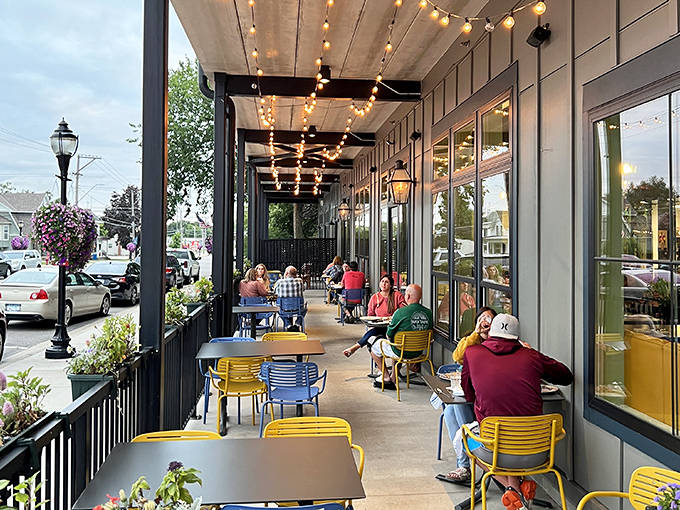 The patio's cheerful yellow chairs invite you to linger under twinkling lights &ndash; Minnesota's answer to dining al fresco on a New Orleans evening.