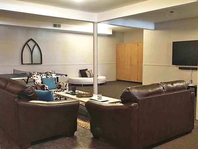 Leather couches and entertainment options in the basement level &ndash; proof that even churches understand the need for downtime.