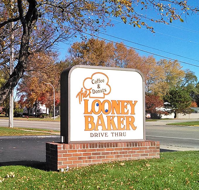 The roadside sign stands as a landmark for locals and a discovery for visitors – either way, it points to happiness.