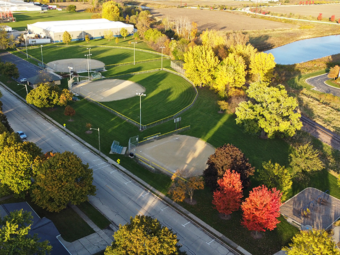 McCormick Park's shaded picnic areas offer respite from summer heat, inviting families to gather around tables where memories are made between bites of sandwiches.