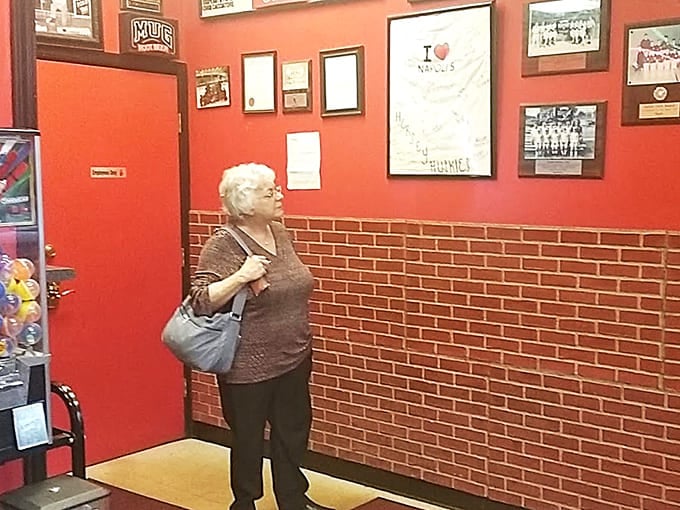 The interior tells stories of countless meals shared, celebrations had, and pizzas devoured with pure joy.