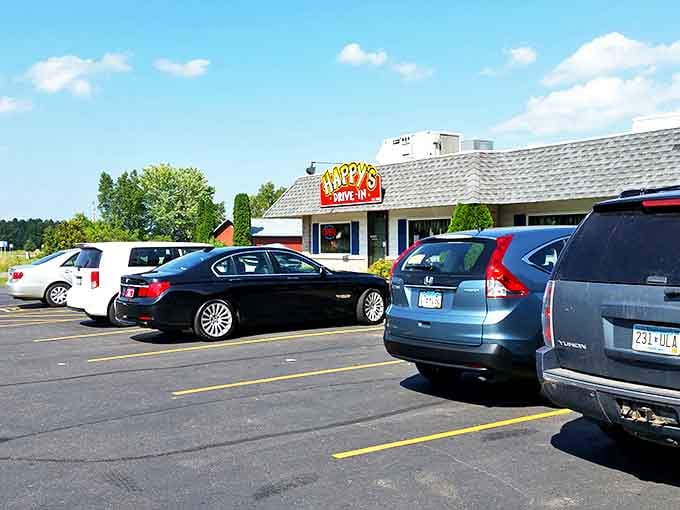 The parking lot fills with vehicles of all kinds, their drivers united by one common mission: experiencing Happy's legendary offerings.