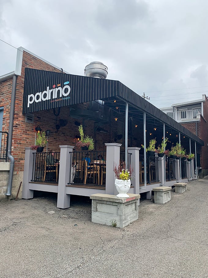 The outdoor patio at Padrino offers al fresco dining with charm to spare &ndash; those string lights aren't just decoration, they're setting the stage for memory-making.