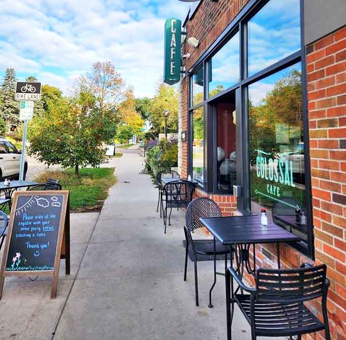 Sidewalk seating at Colossal Cafe offers prime people-watching during Minnesota's precious outdoor dining season.