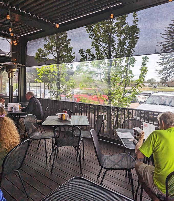 The covered patio offers al fresco dining when Michigan weather cooperates &ndash; simple pleasures in good company.
