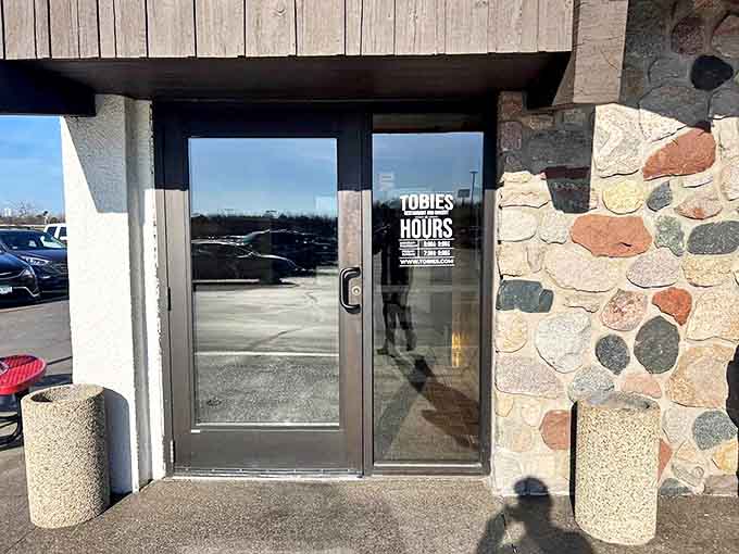 The stone facade and clean lines of Tobie's entrance offer a hint of the no-nonsense, quality experience waiting inside this beloved Minnesota institution.