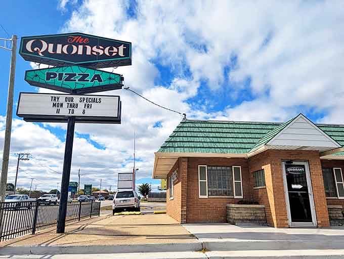 Daytime view of Millie's charming exterior &ndash; that mint green building has become a beacon for flavor seekers.